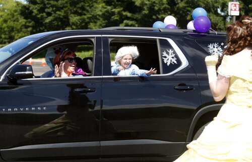 Princess and superheroes abound at drive-through Character Parade