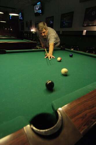 Taking a shot: Bob McCullough's draws sports fans, pool players