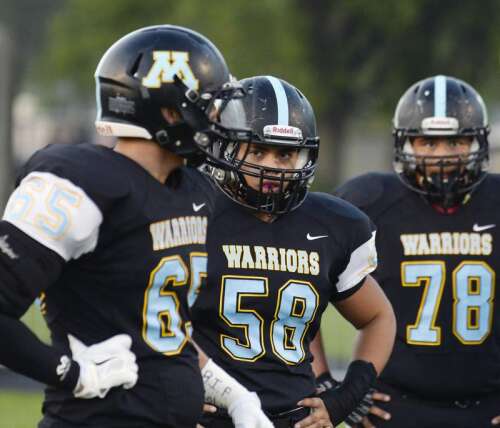 Meet the Maine West football player who moonlights as fire dancer