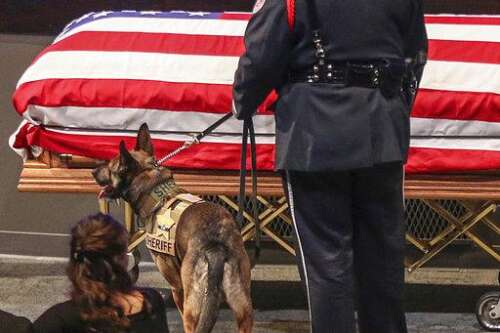 Holcomb: Indiana deputy's killing shows that 'evil exists'