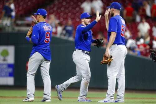 Rizzo celebrates, Cubs beat Reds 12-5 for biggest lead