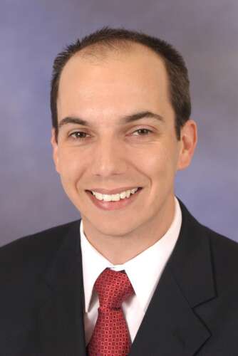 Breuder sues College of DuPage board, Hamilton faction over firing