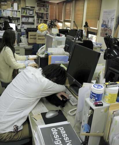 Japanese companies encouraging power naps at work