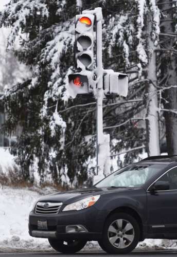 Traffic lights covered? Storm shows LEDs can't melt snow, ice covering them