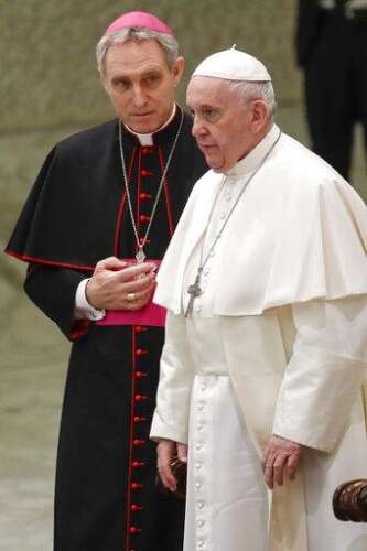 Vatican seeks to explain absence of aide after book scandal