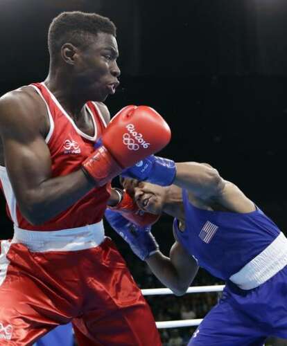 American boxer Gary Russell wins 1st Olympic bout for family