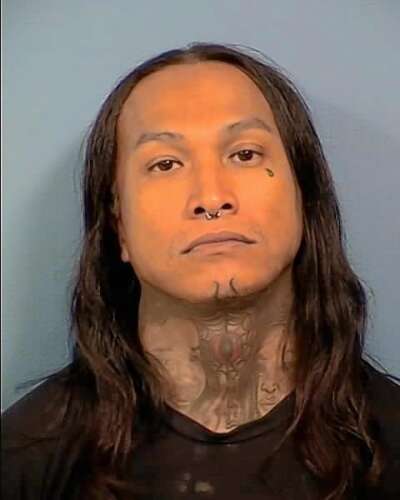 Two charged with shooting defaced gun near Hinsdale