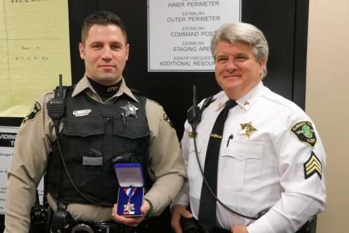 Elmhurst police officer saves two lives within a year
