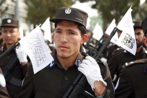 Taliban official wanted by U.S. makes rare public appearance