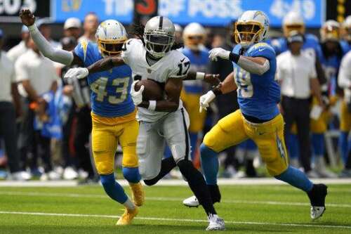Herbert throws 3 TD passes, Chargers beat Raiders 24-19