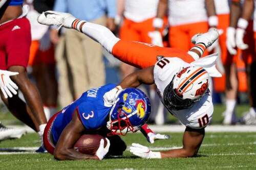 Neal leads Kansas past No. 18 Oklahoma State, 37-16