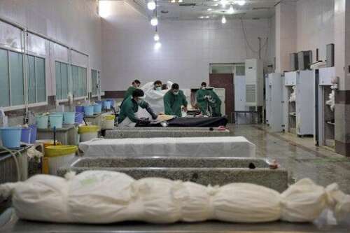 Sanctions-battered Iran, weary of pandemic, faces worst wave