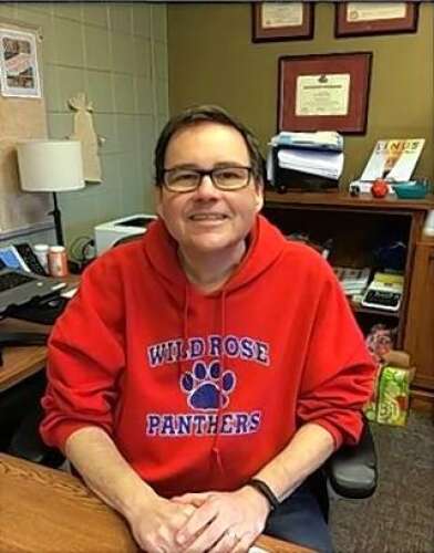 Wild Rose Elementary dedicates library to former principal Robert Allison