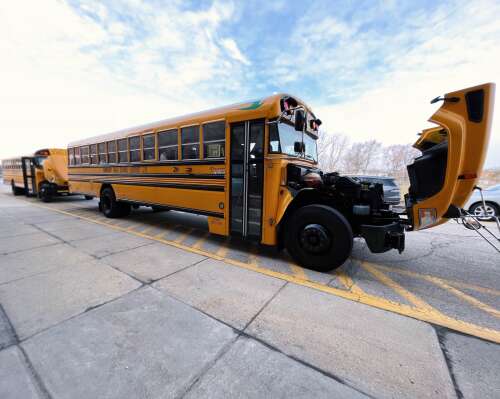 District 211 buses create a lecture at Fremd High School