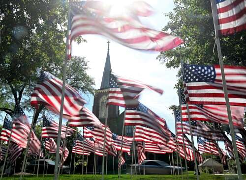 9/11 remembered with fields of flags; World Trade Center survivor to ...