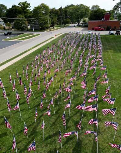 9/11 remembered with fields of flags; World Trade Center survivor to ...