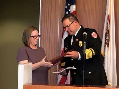 Wheeling woman honored for saving neighbor’s life