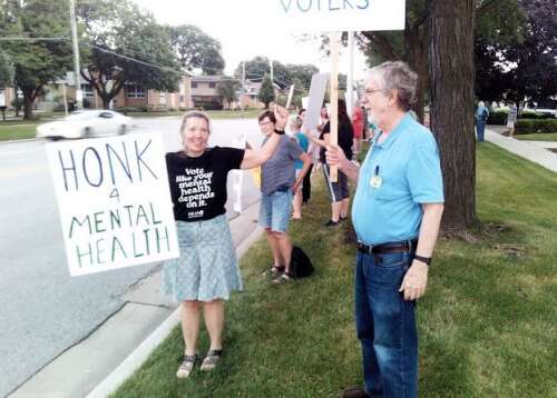 Protesters demand Wheeling Township act on mental health funding