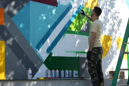 ‘A ray of sunshine’: New Wheaton mural brightens downtown plaza