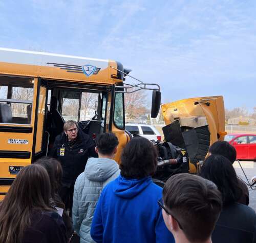 District 211 buses create a lecture at Fremd High School