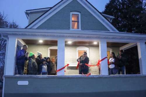 North Chicago woman takes ownership of her first home